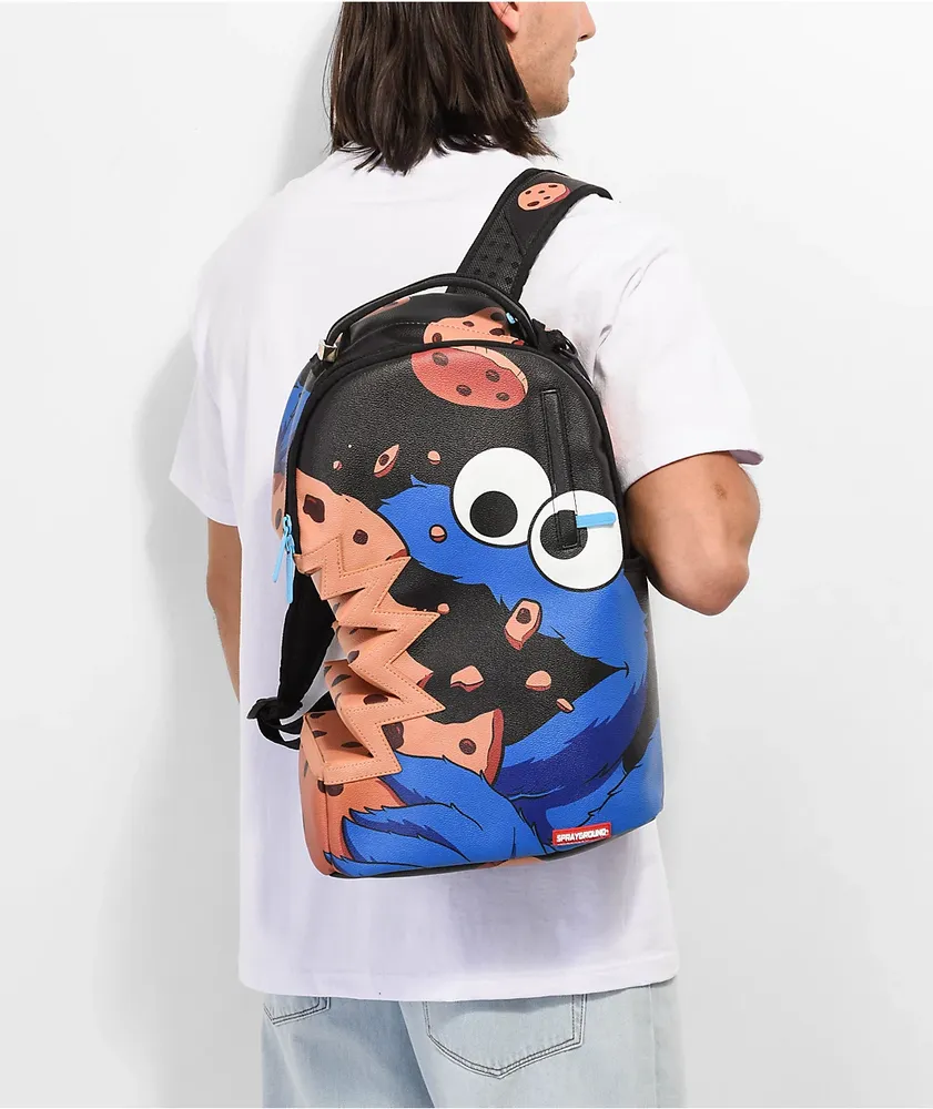 Sprayground x Sesame Street Cookie Monster Shark Bite Backpack at Mall ...